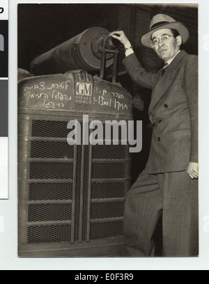 Sam Ziff stands in front of a generator, prepared for transport to a ...