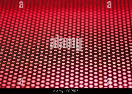 Metal grid with hole patterns and colored lights Stock Photo - Alamy