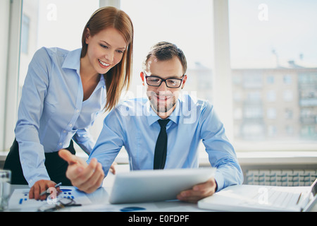 Two successful business partners working at meeting in office Stock ...