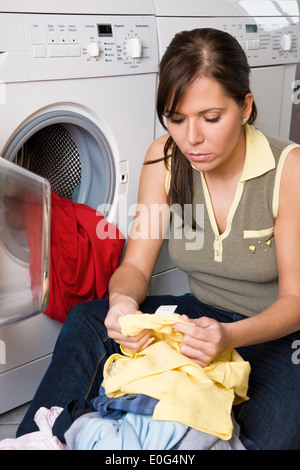 washing care symbols instructions label in 100% cotton hoodie garment ...