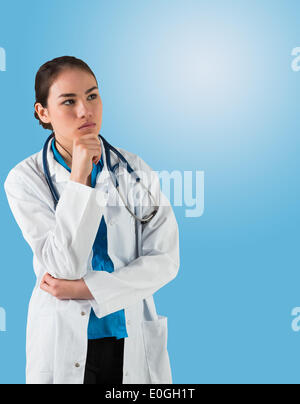Focused female doctor frowning and thinking while standing near male ...