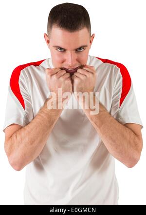 Nervous football player looking at camera on white background Stock ...
