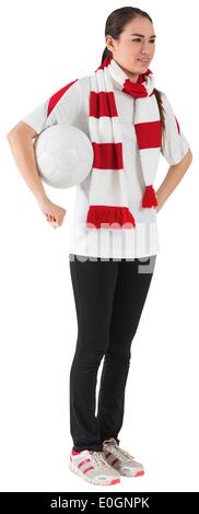 Smiling football fan in white on white background Stock Photo - Alamy