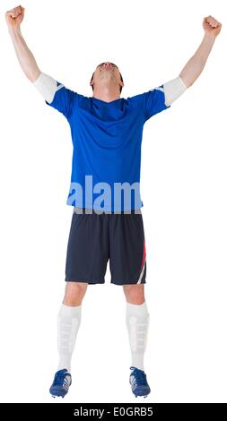 Football player celebrating win Stock Photo - Alamy