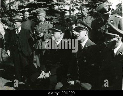 A photograph of Vidkun Quisling with German officers during World War ...