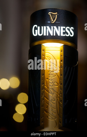 Guinness hand pump Stock Photo - Alamy