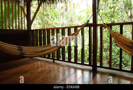 Hammocks at a jungle lodge in the Amazon rainforest Stock Photo - Alamy
