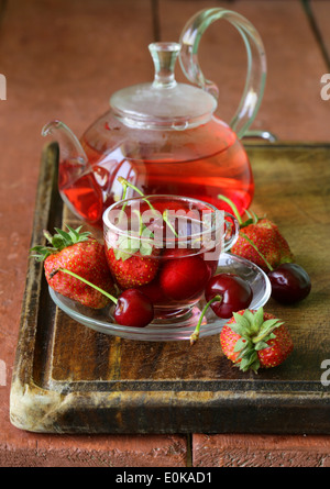 summer fruit tea with a variety of berries (cherry, strawberry Stock ...