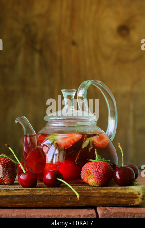 summer fruit tea with a variety of berries (cherry, strawberry Stock ...
