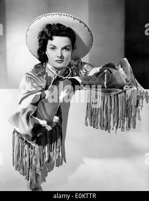 Actress Jane Russell laying on the beach Stock Photo - Alamy