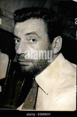 French screen actor Yves Montand kisses the hand of Italian actress ...