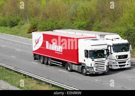 Lorry overtaking another lorry - UK Stock Photo - Alamy