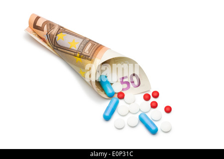 Pils and capsules with Euro money Stock Photo - Alamy