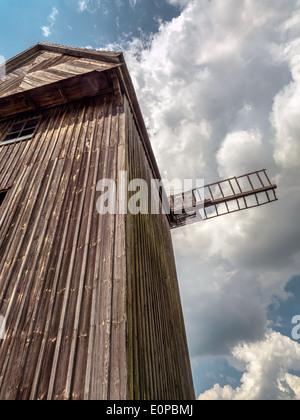 Old wooden windmill against blue sky Stock Photo - Alamy