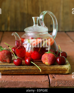 summer fruit tea with a variety of berries (cherry, strawberry Stock ...