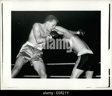 Henry Cooper ( left ) and Joe Erskine ( right ) at the weigh - in this ...