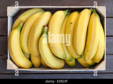 Tropical fruit on yellow wooden background, fresh food Stock Photo - Alamy