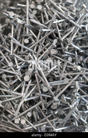 Metal steel nails texture construction background Stock Photo - Alamy