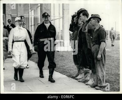 Jun. 06, 1958 - Queen goes down a mine wearing white boiler suit. H.M ...