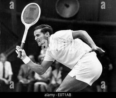 ROY EMERSON WINS MENS SINGLES V FRED STOLLE IN ACTION IN THE ALL ...