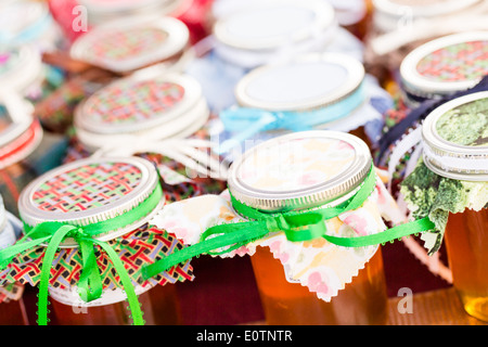 Cute jars with honey at the local Farmers market Stock Photo - Alamy