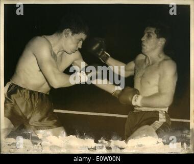 British Middleweight Champion Terry Downes sweats it out on a gymnasium ...