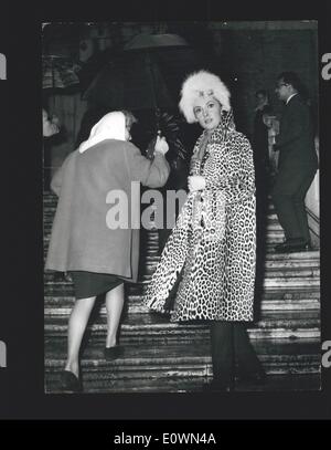 Dec. 12, 1963 - Gina Lollobrigida wearing a pair of trousers, a white ...