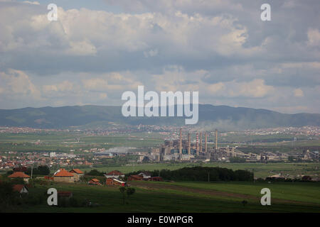 Obiliq, Kosovo. 9th May, 2014. A resident of Obiliq hears lectures of ...