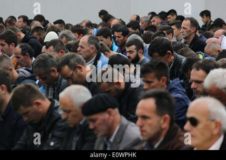 Obiliq, Kosovo. 9th May, 2014. A resident of Obiliq hears lectures of ...