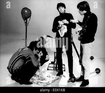 The Beatles' Paul McCartney eating on a break while on tour Stock Photo ...