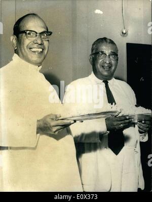 Prime minister of Ceylon, Dudley Senanayake, right, is greeted by ...