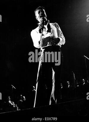 Entertainer Sammy Davis Jr., center, sunglasses, stands in between Dr ...