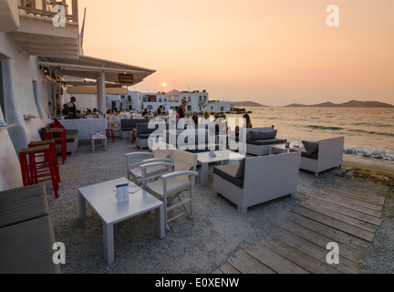 Sunset on the seaside in Greece, red light and few clouds in the sky ...