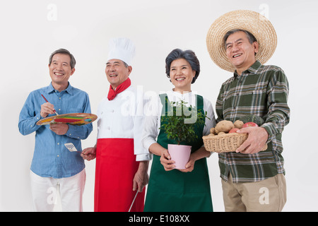 four old people from different professions posing Stock Photo - Alamy
