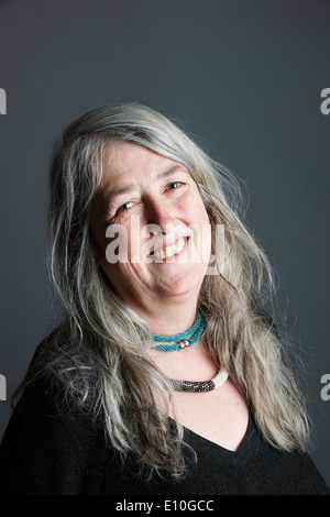Classicist Professor Mary Beard in her signature red coat, filming BBC ...