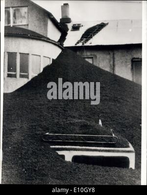 Buildings collapse under the weight of volcanic ash and typhoon rains ...