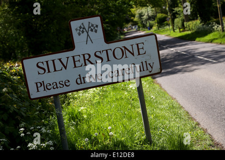 Silverstone "please drive carefully" sign Stock Photo - Alamy