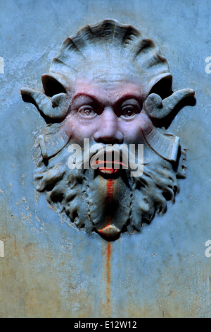 Neptune's face high relief Stock Photo - Alamy