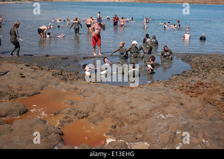 People bathing in the mud in the Dead Sea, Israel Stock Photo: 69533462 ...