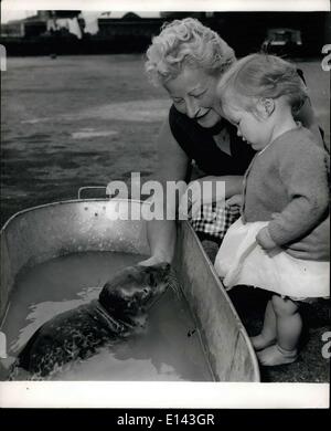 With is wife Katie and daughter Grace, left, looking on, Martin O ...