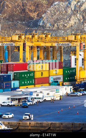 Containers stacked on the Quay at Muscat, Oman Stock Photo - Alamy