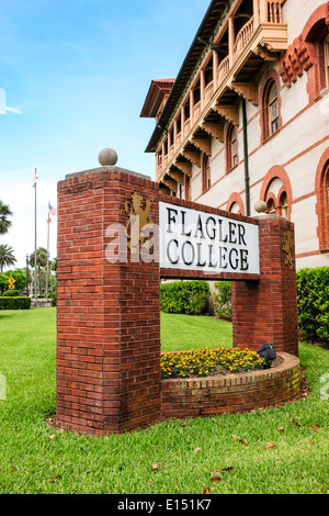 The sign of Flagler College with the college campus in the background ...