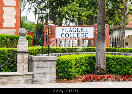 The sign of Flagler College with the college campus in the background ...