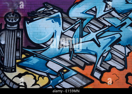 Gun graffiti on wall in Sarajevo alley Stock Photo - Alamy