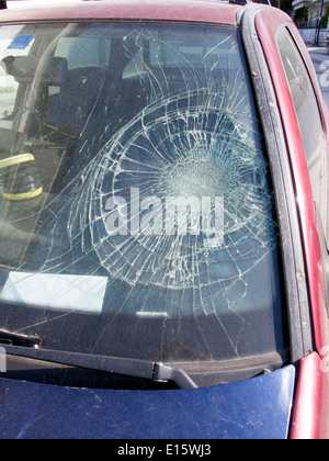 Detail of damage to windscreen of car shattered by vandalism Stock ...