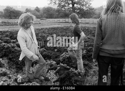Hippies on hippy hippie commune carrying a tray of cannabis marijuana ...