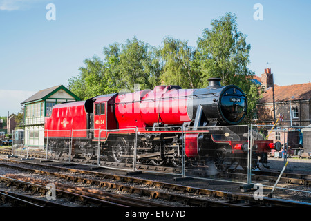 Preserved class 8F steam locomotive No. 48305 leaving Quorn on the ...