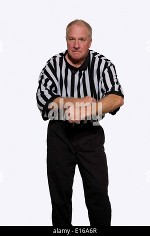 Man dressed as a basketball referee giving signal for jump ball Stock ...