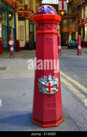 Traditional old-fashioned street bollards in London, UK. The cast iron ...