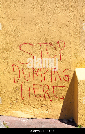 Rubbish dump with graffiti Stock Photo - Alamy